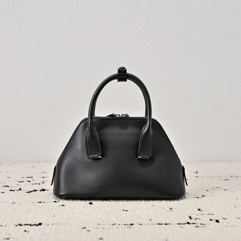The Row Top Handle Bags