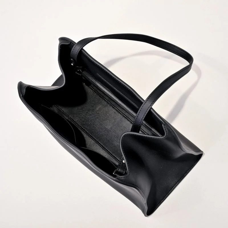Accurate model The Row Top Handle Bags