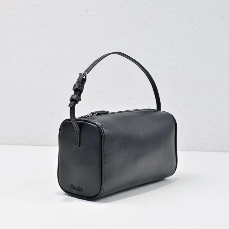 The Row Top Handle Bags
