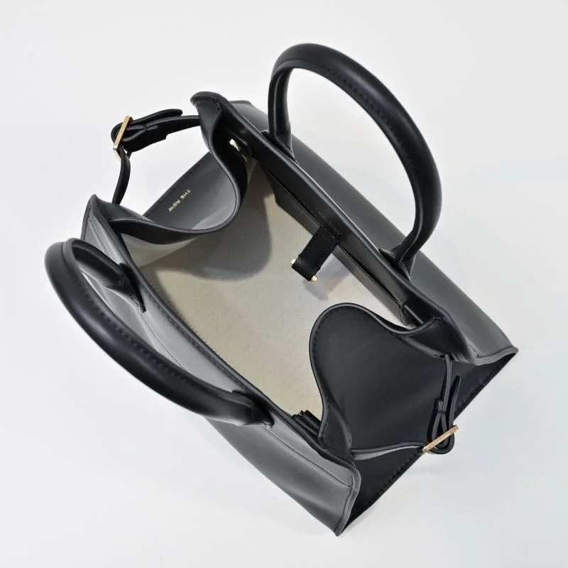 Budget-friendly The Row Top Handle Bags