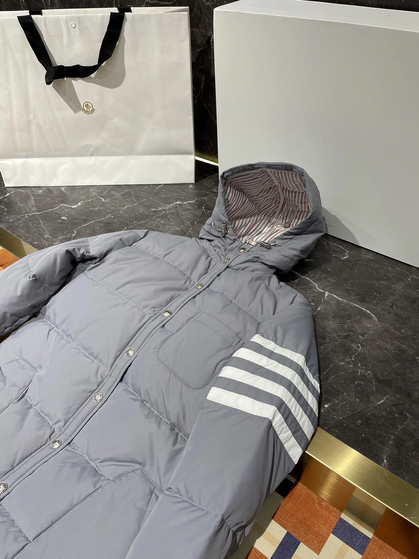 Budget-friendly Thom Browne Down Jackets