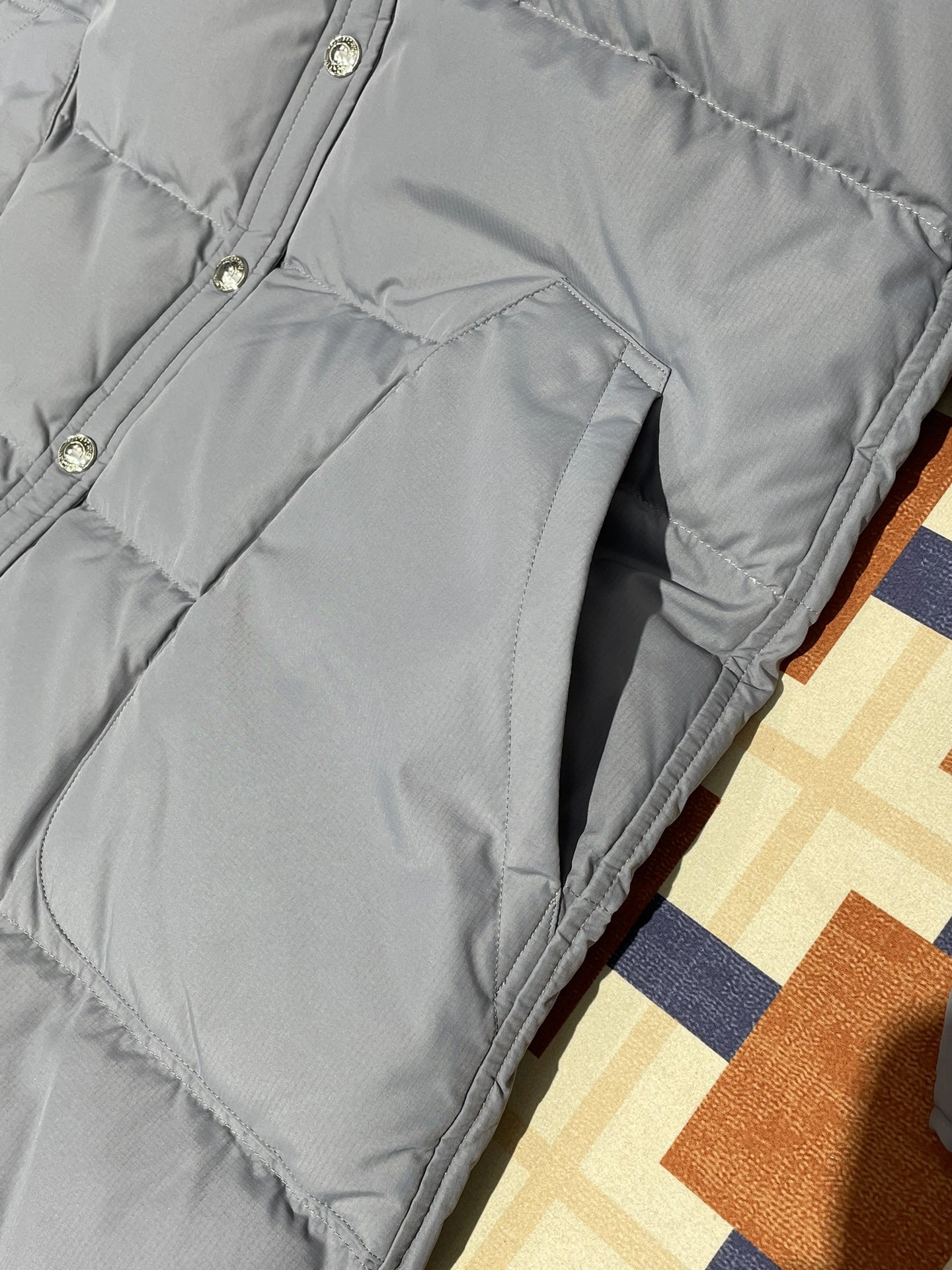 Budget-friendly Thom Browne Down Jackets