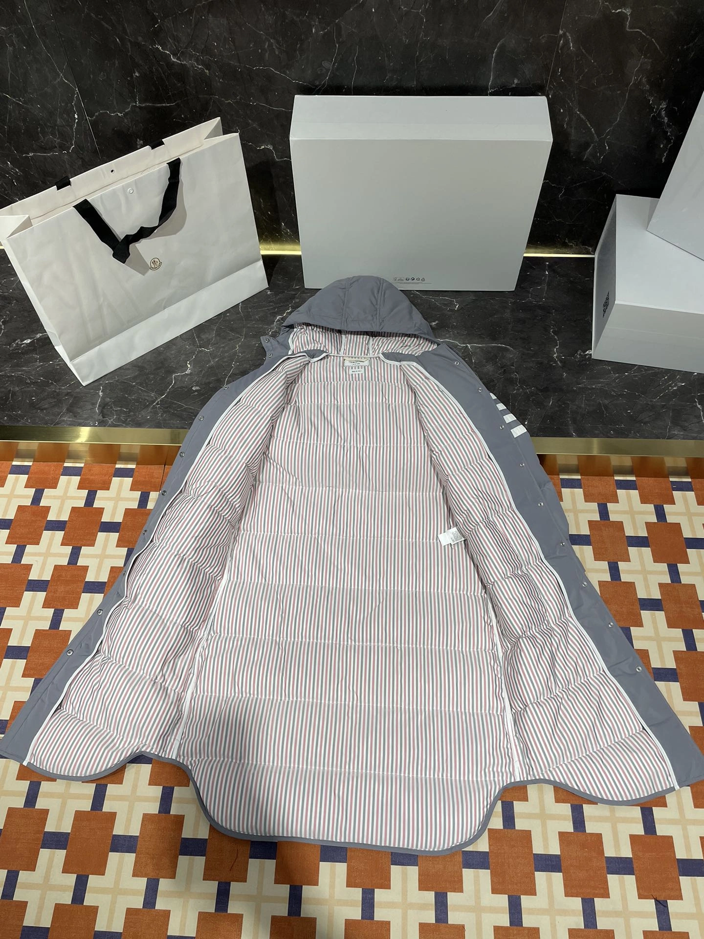 Budget-friendly Thom Browne Down Jackets