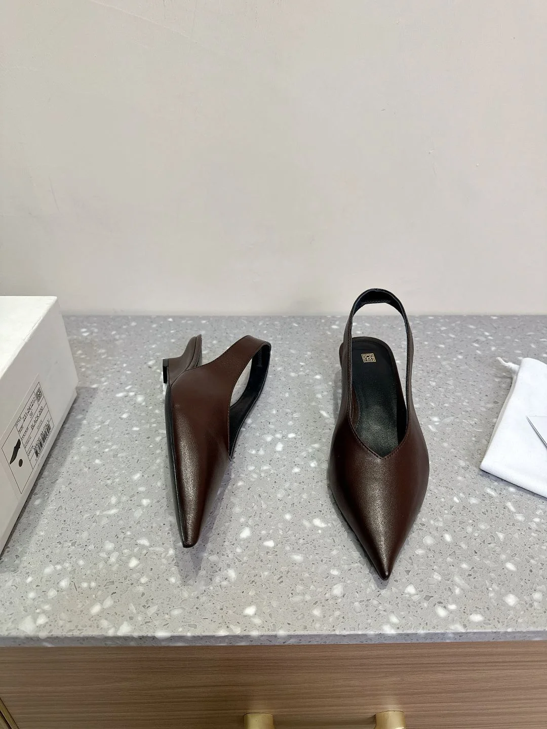 Budget-friendly Toteme Sandals
