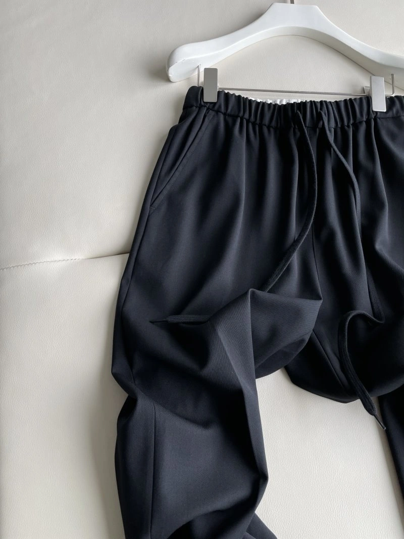 Exact replica Unclassified Brand Long Pants
