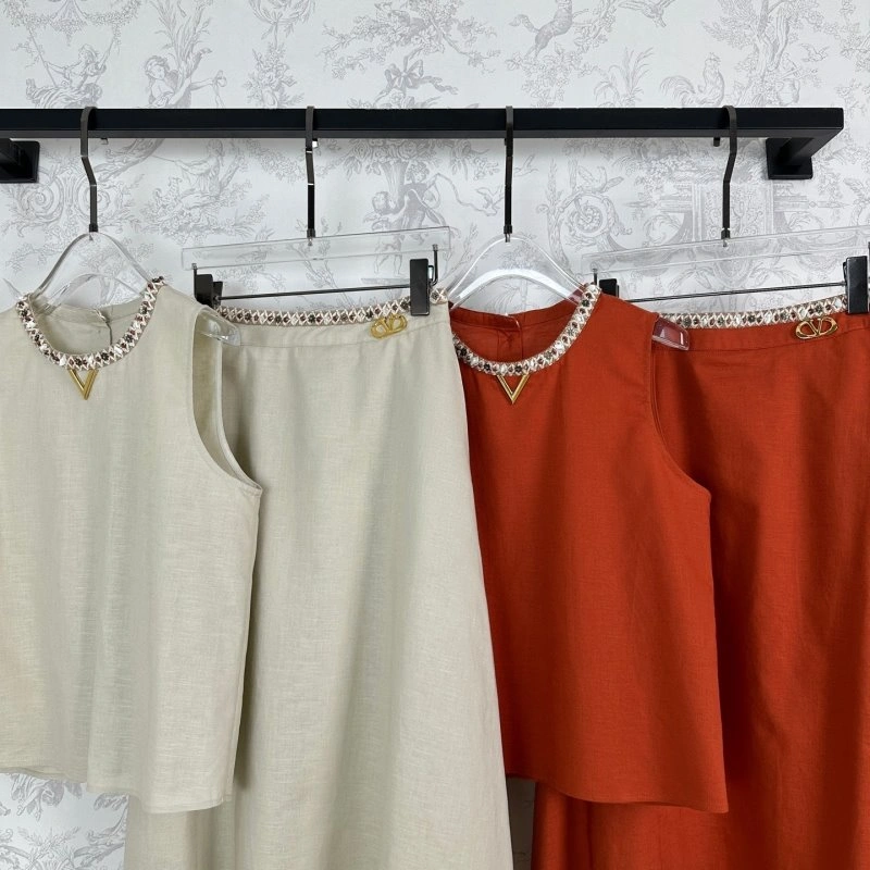 Genuine Valentino Dress Suits