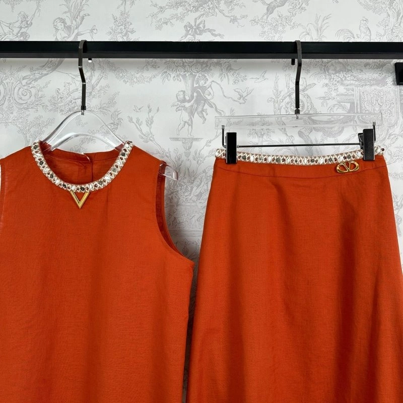 Genuine Valentino Dress Suits