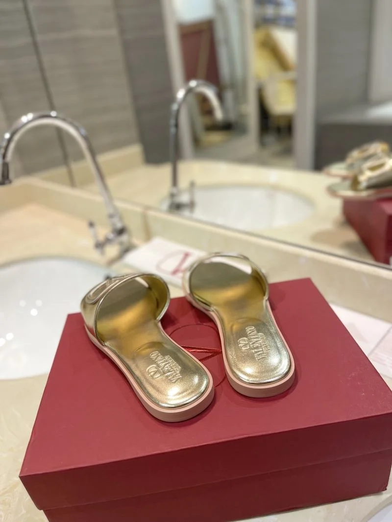 Brand-authenticated Valentino Slippers