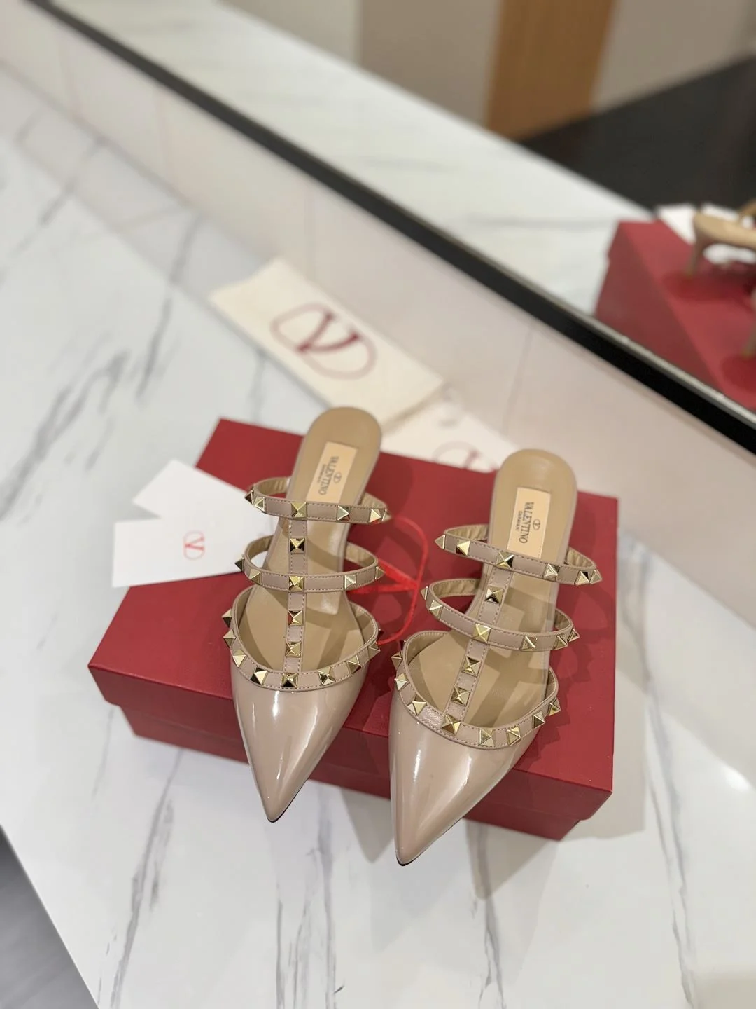 Value-priced Valentino Slippers