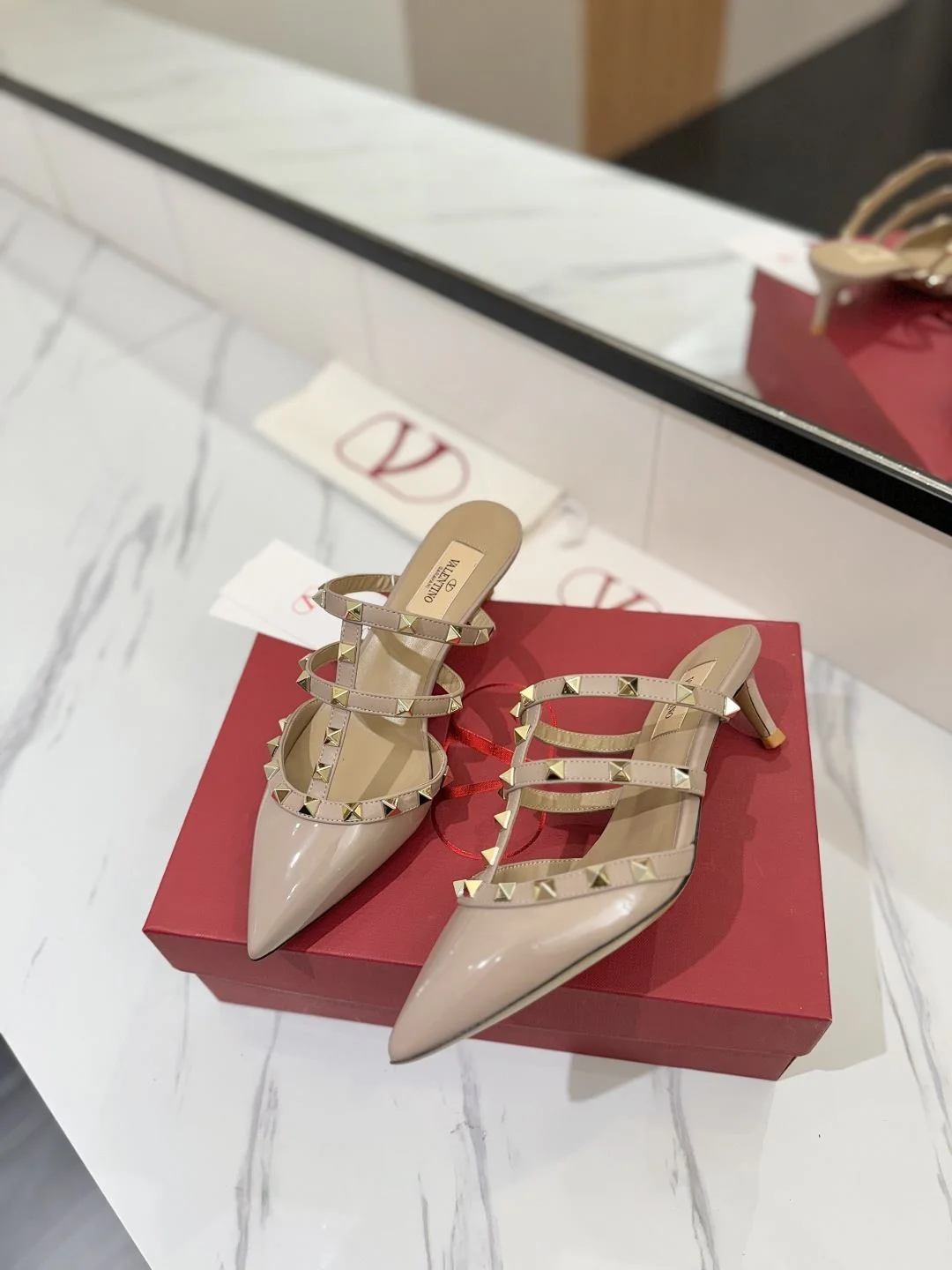 Value-priced Valentino Slippers