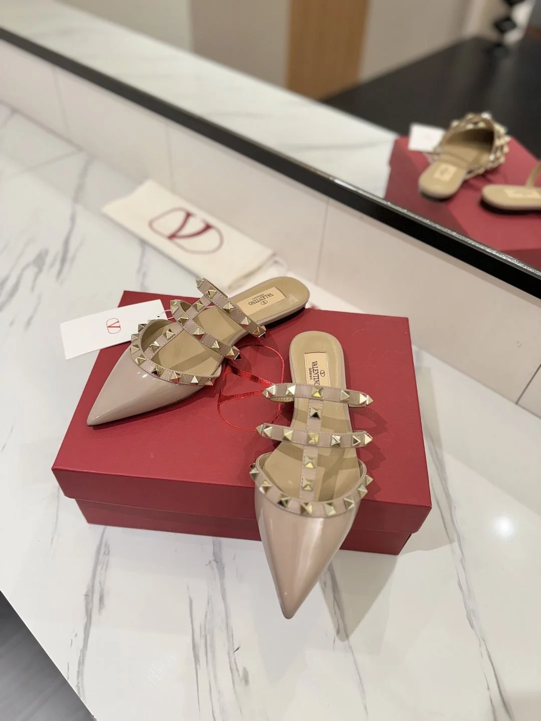 Indistinguishable Valentino Slippers