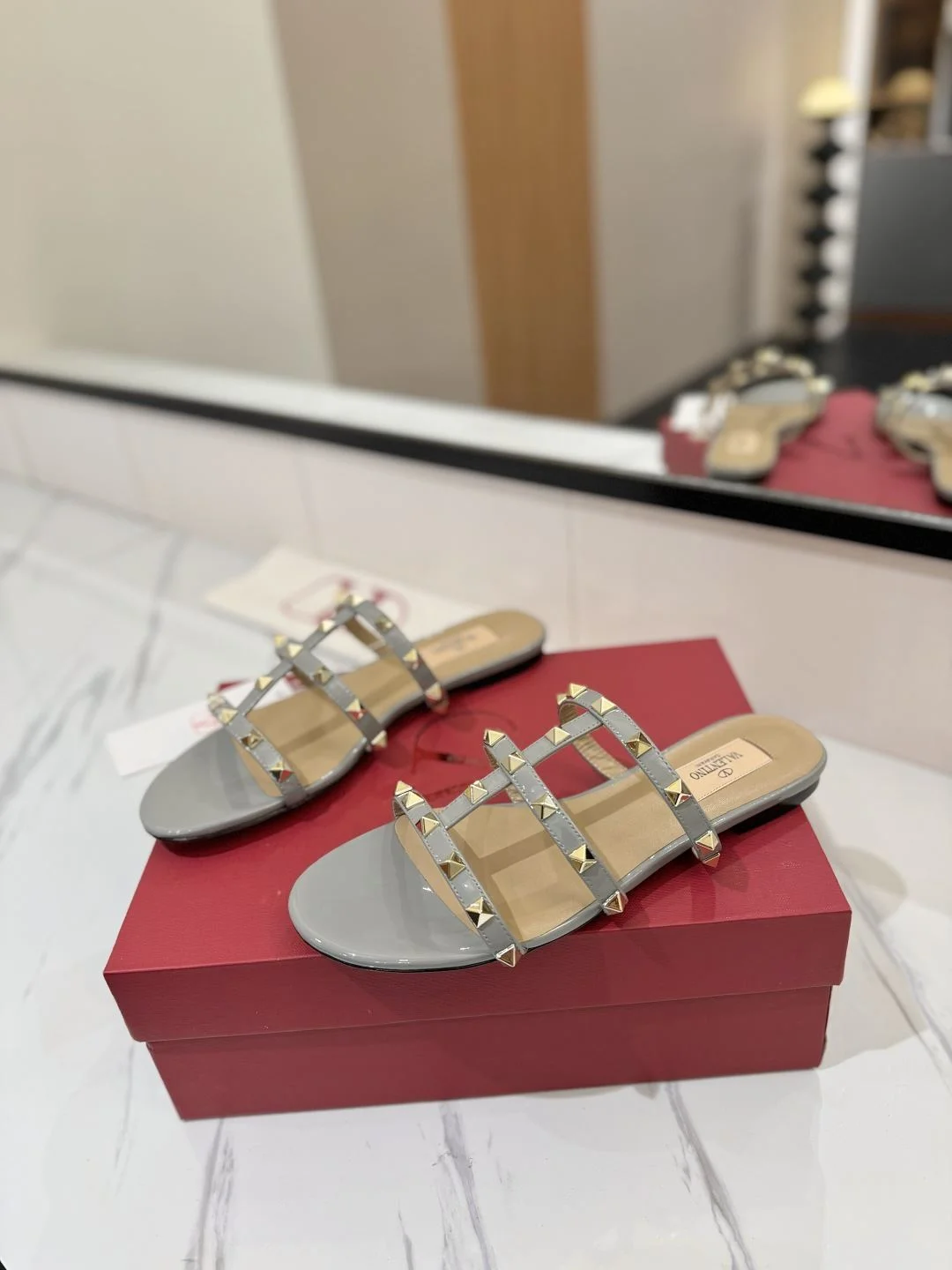 Brand-authenticated Valentino Slippers