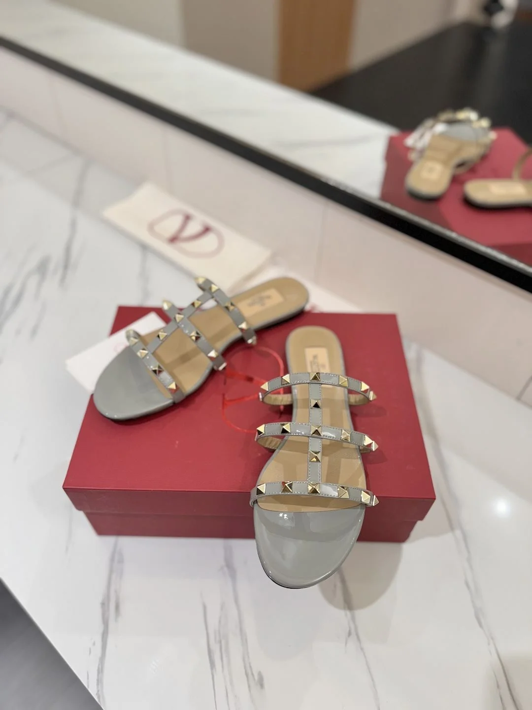Brand-authenticated Valentino Slippers