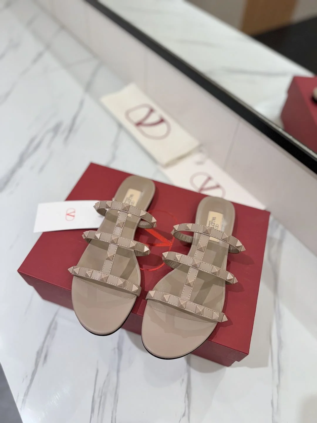 Brand-authenticated Valentino Slippers