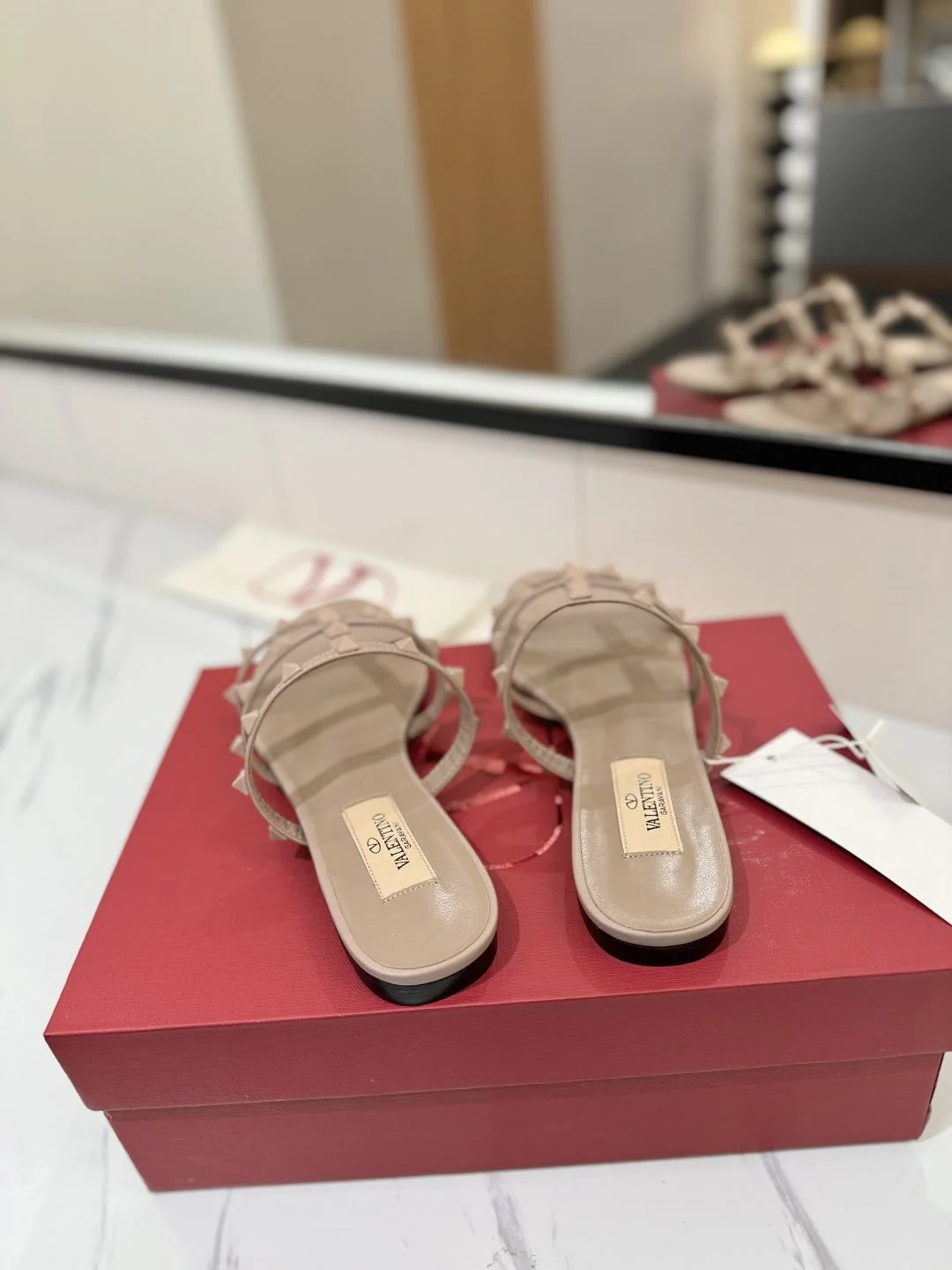 Brand-authenticated Valentino Slippers