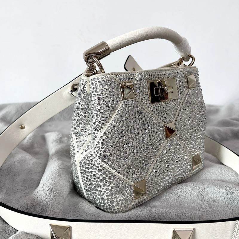 Top mirror Valentino Top Handle Bags