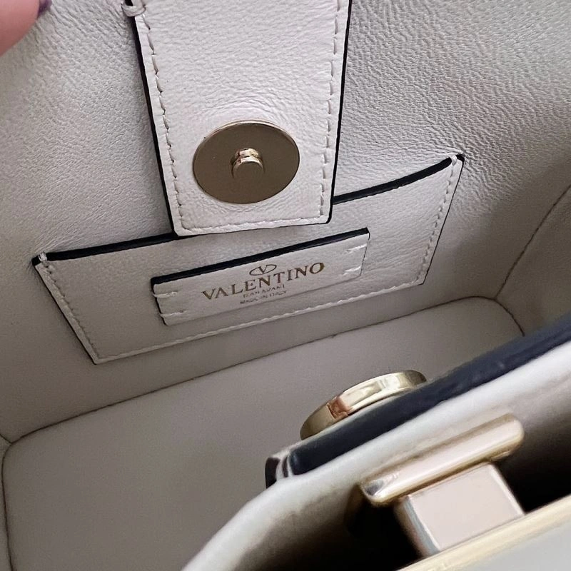 Top mirror Valentino Top Handle Bags