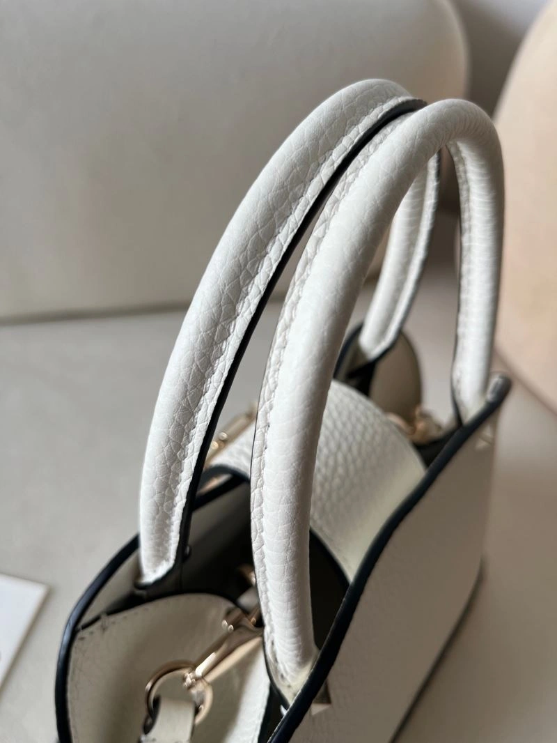 Top mirror Valentino Top Handle Bags