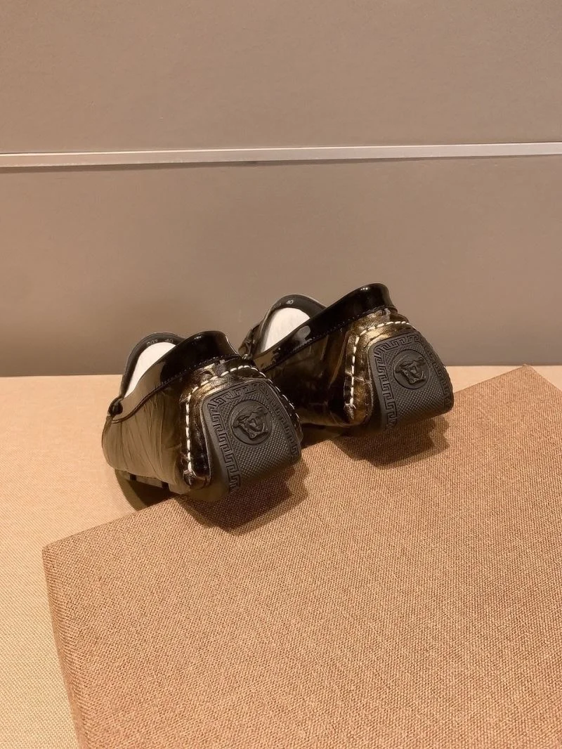 Top mirror Versace Tods Shoes