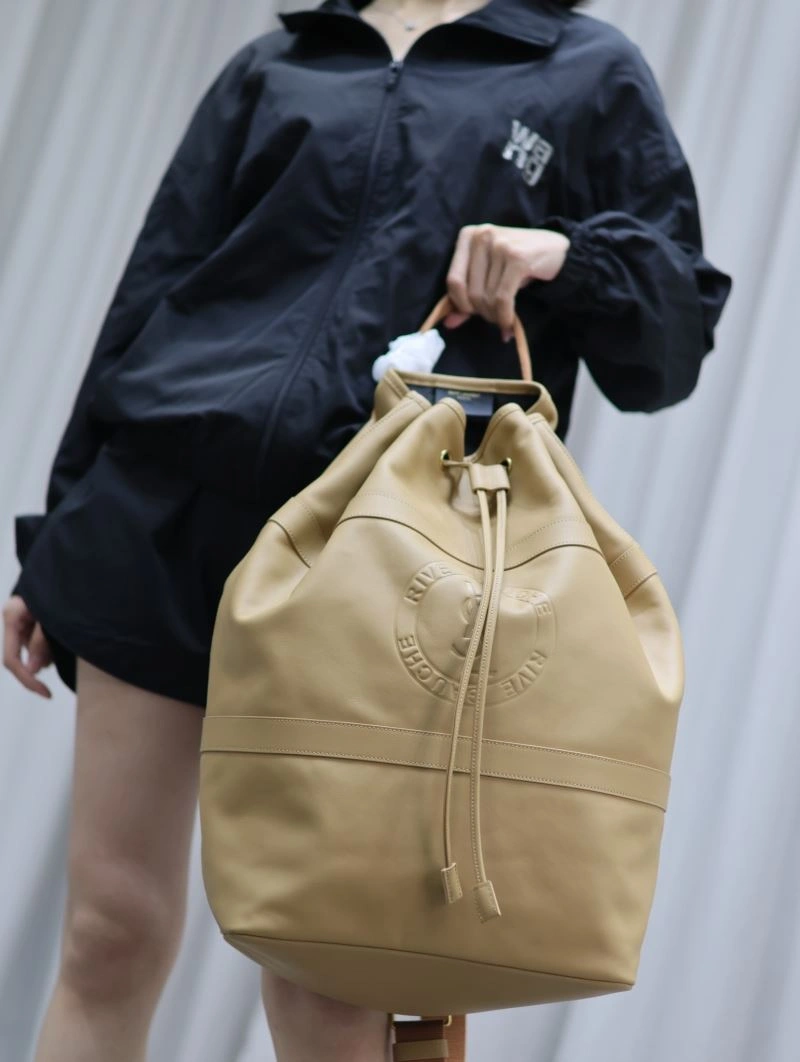 Indistinguishable YSL Backpacks
