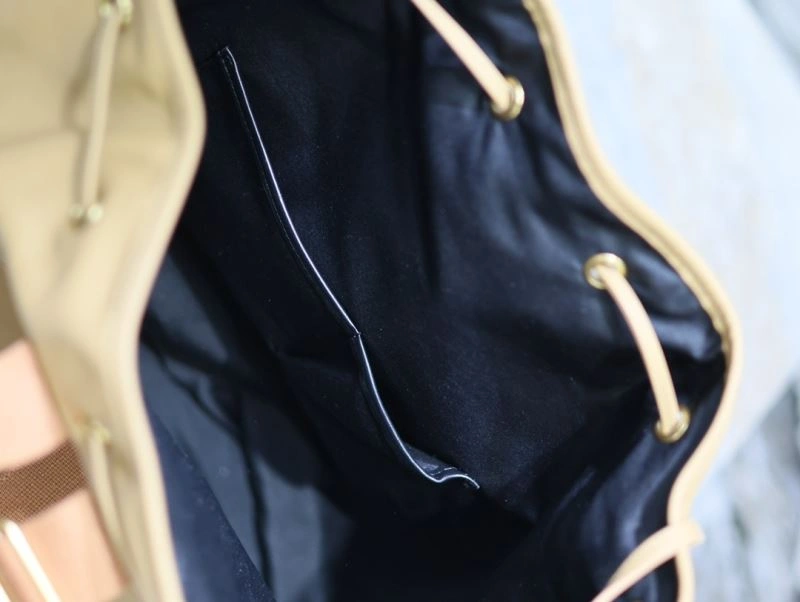 Indistinguishable YSL Backpacks
