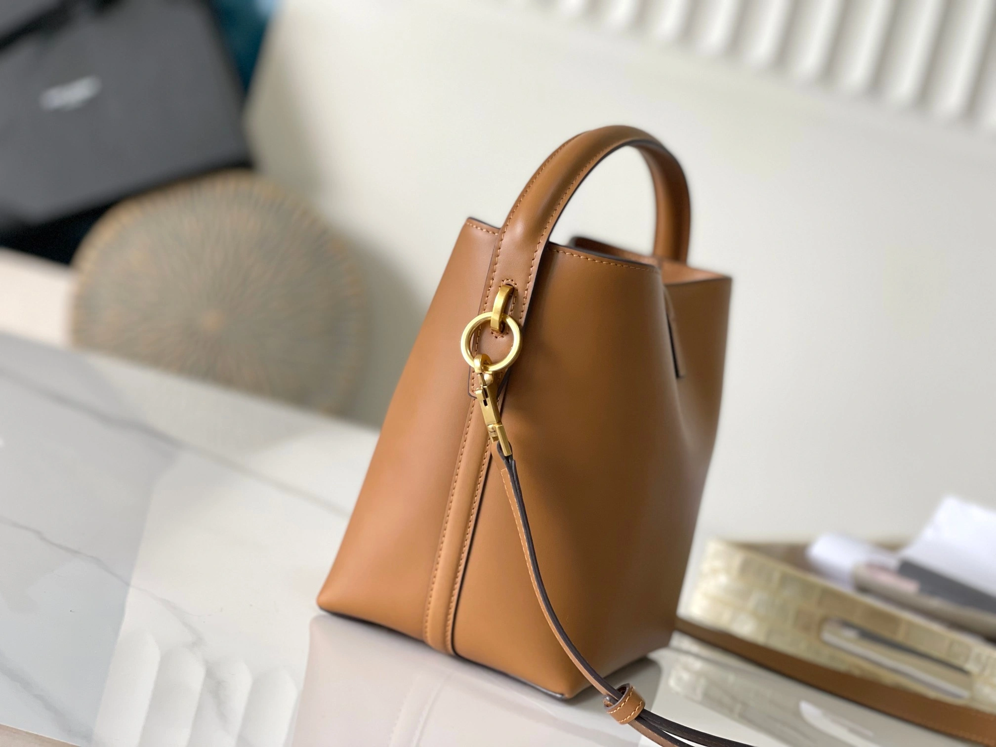Value-priced YSL Bucket Bags