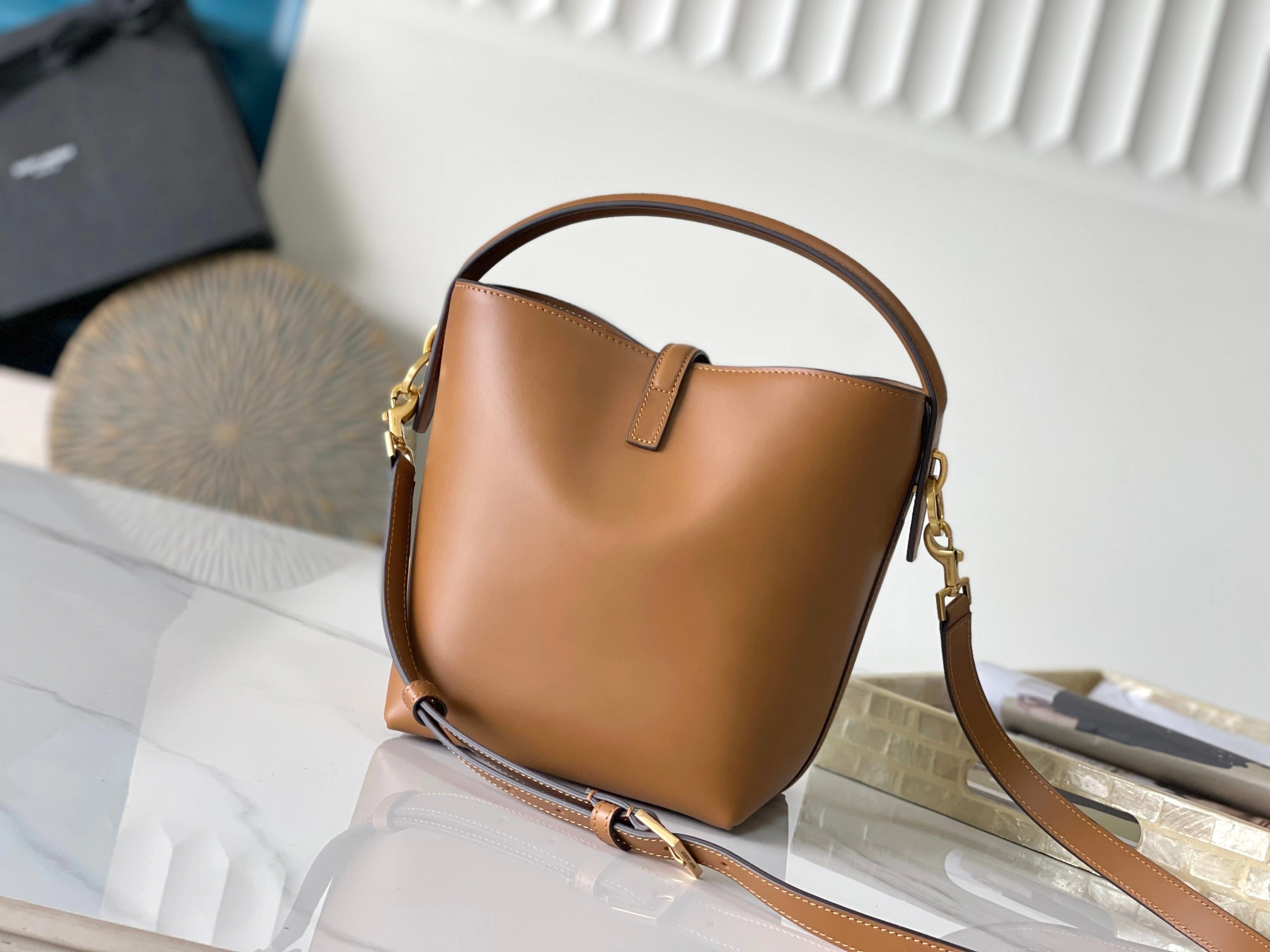 Value-priced YSL Bucket Bags