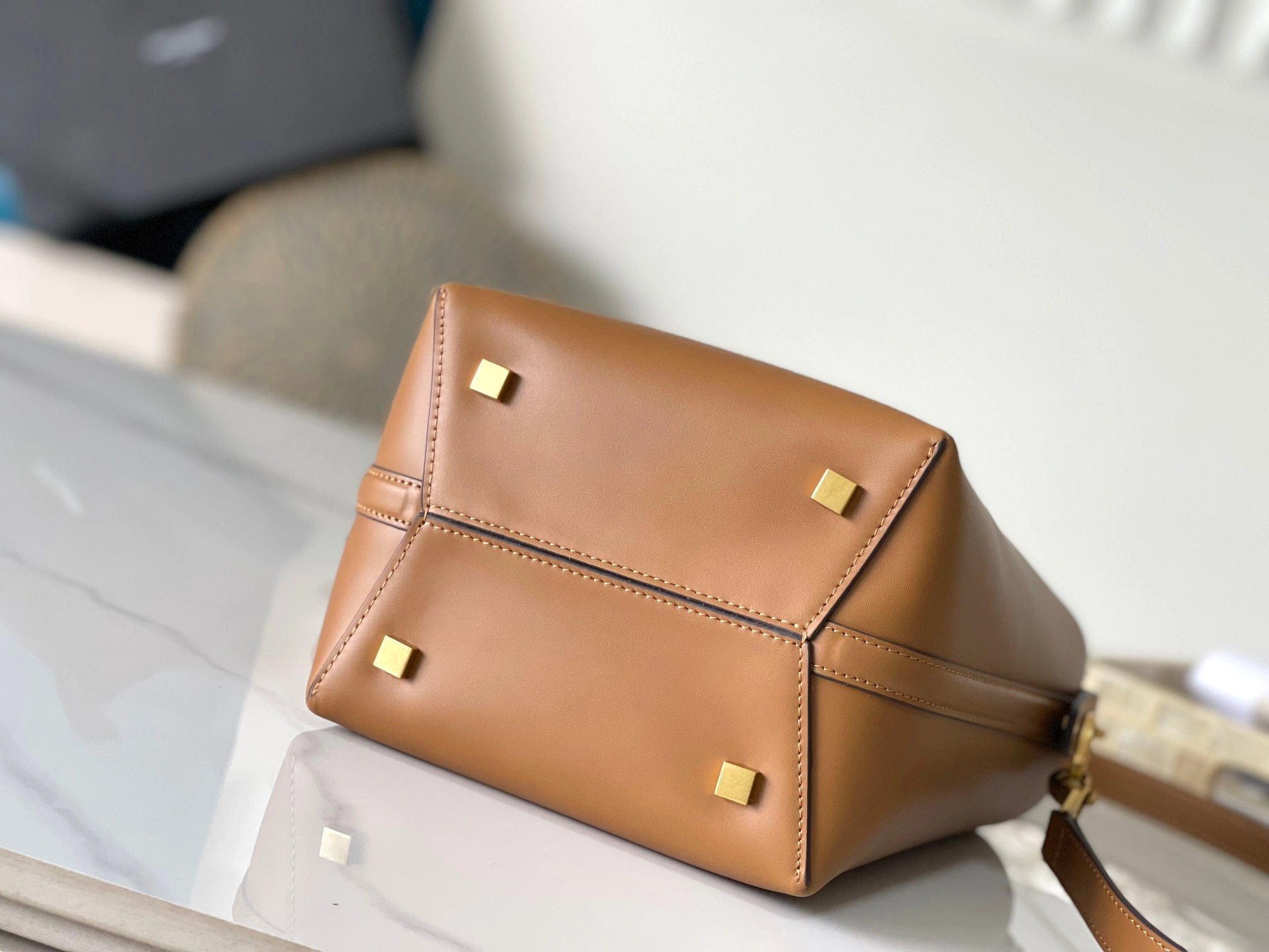 Value-priced YSL Bucket Bags