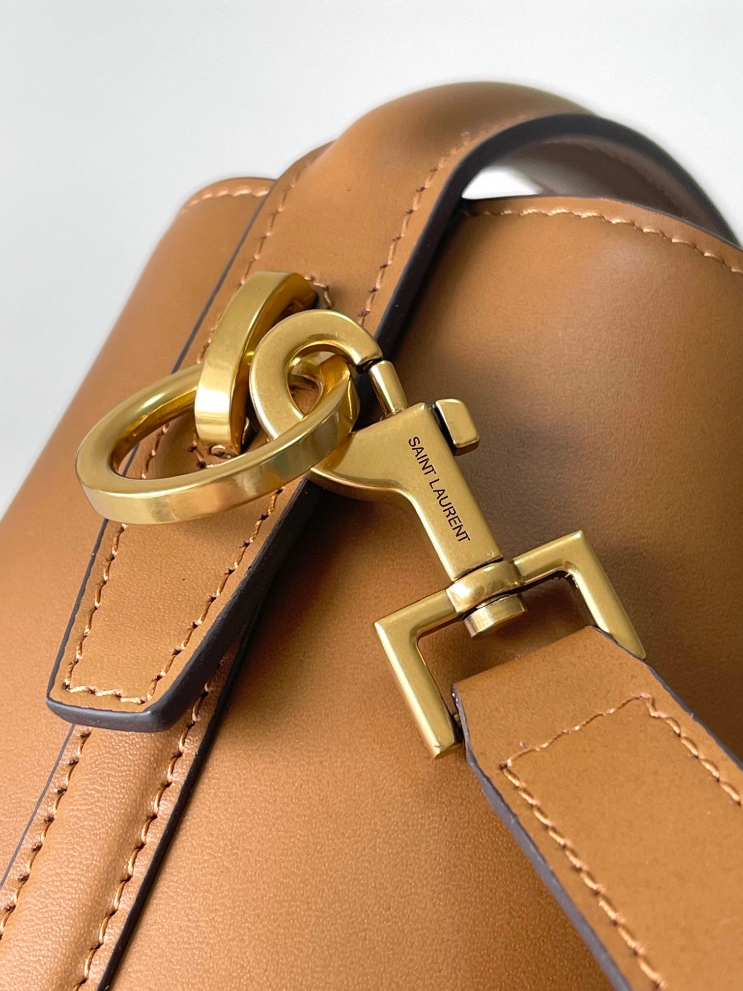 Value-priced YSL Bucket Bags