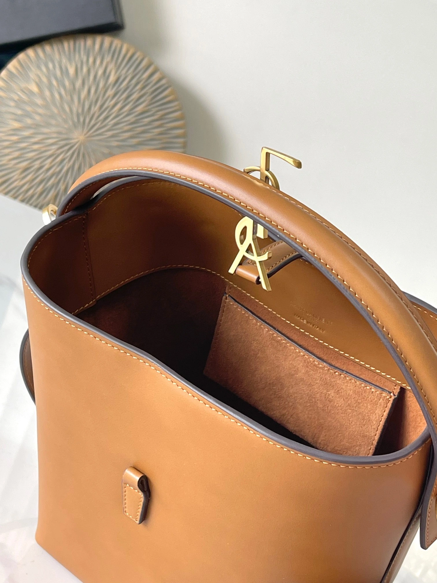 Value-priced YSL Bucket Bags