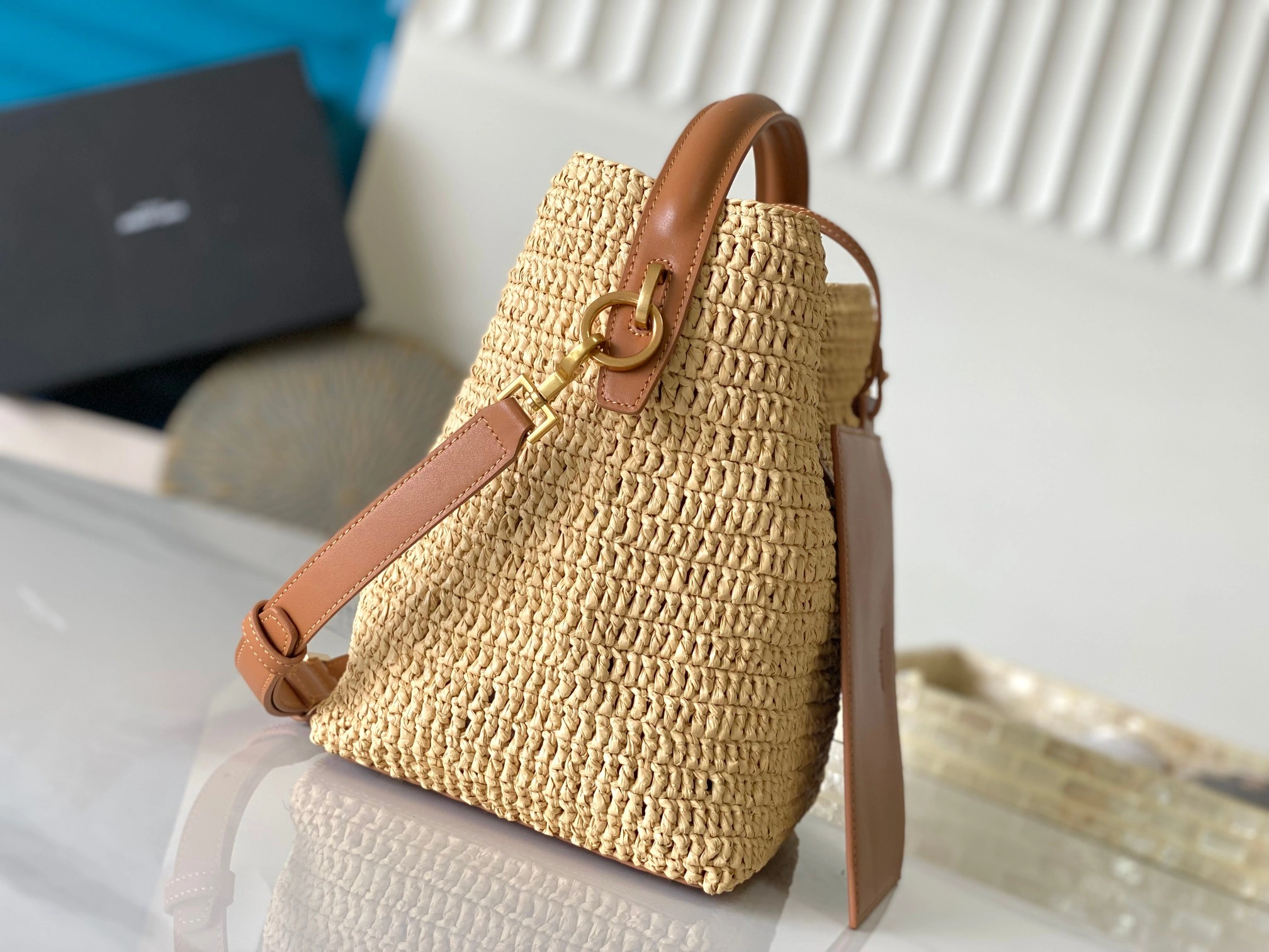 Value-priced YSL Bucket Bags