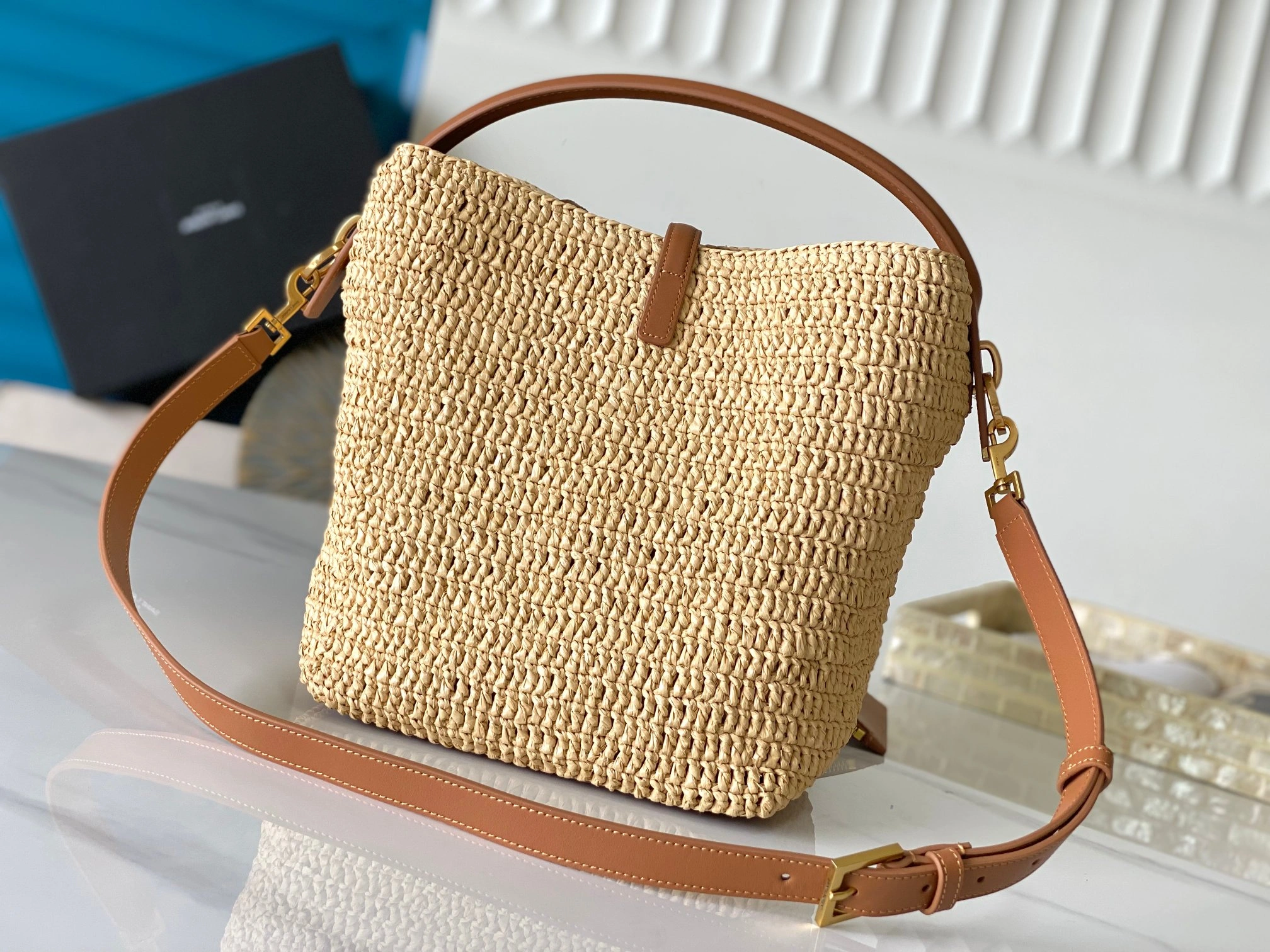 Value-priced YSL Bucket Bags