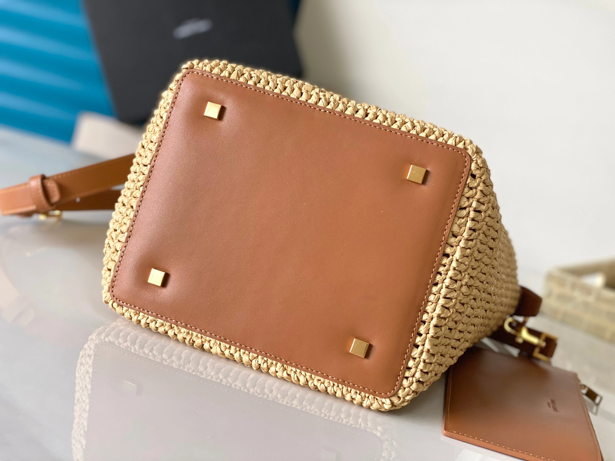 Value-priced YSL Bucket Bags