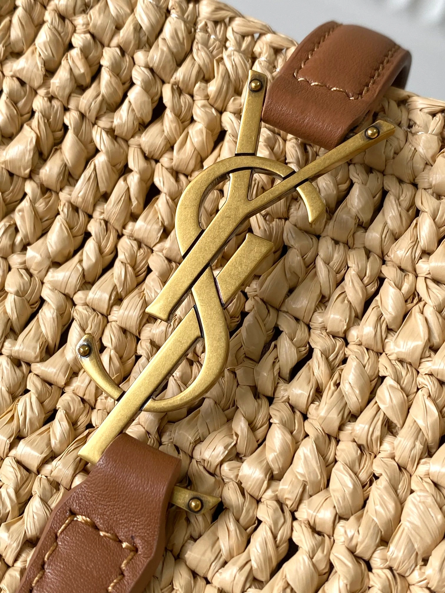 Value-priced YSL Bucket Bags