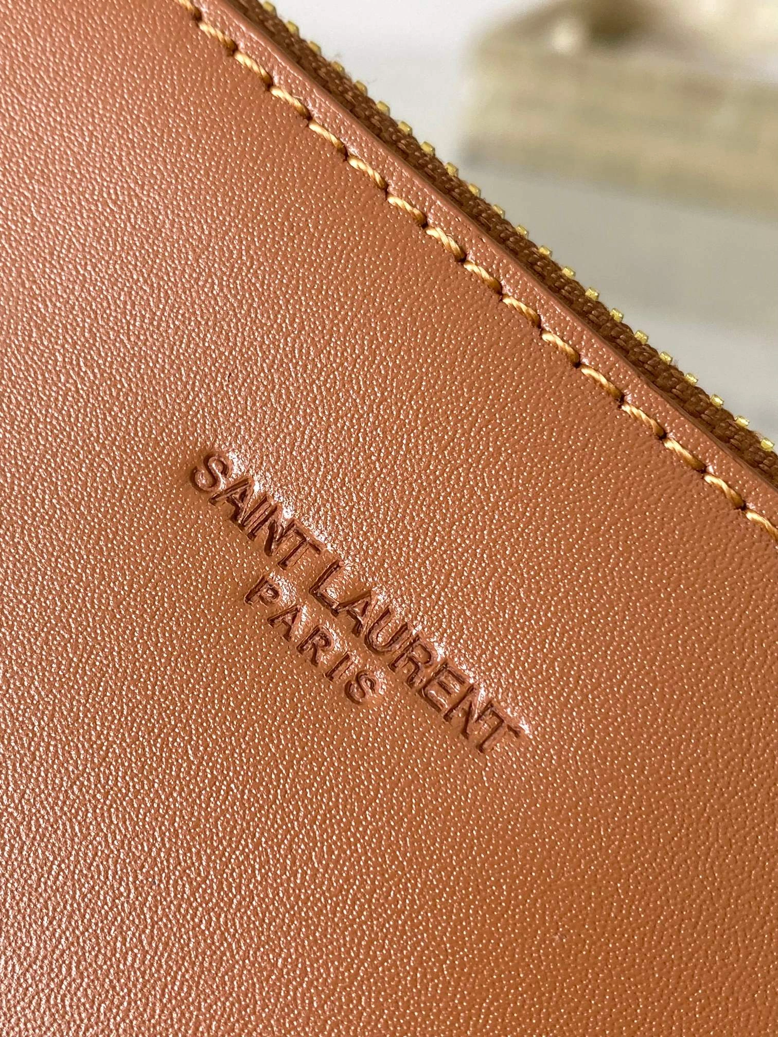 Value-priced YSL Bucket Bags