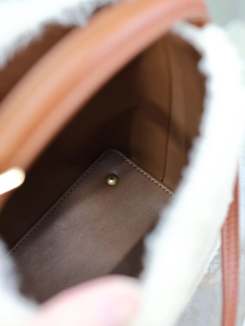 Value-priced YSL Bucket Bags