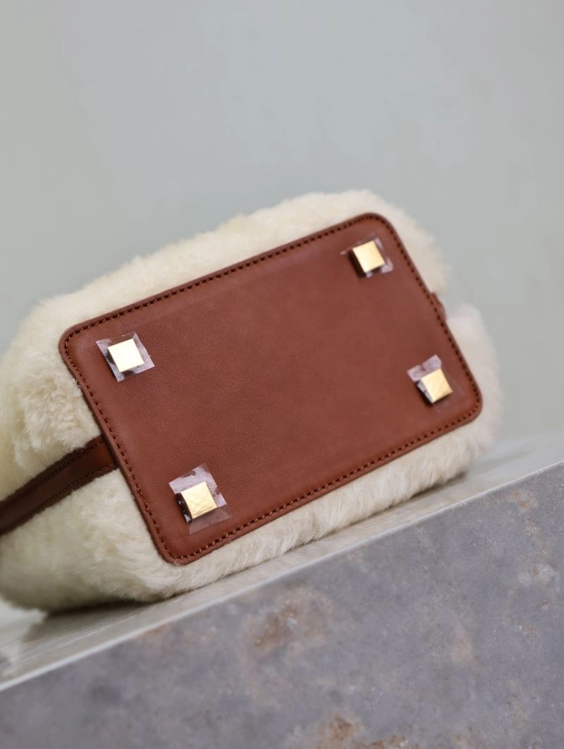 Value-priced YSL Bucket Bags