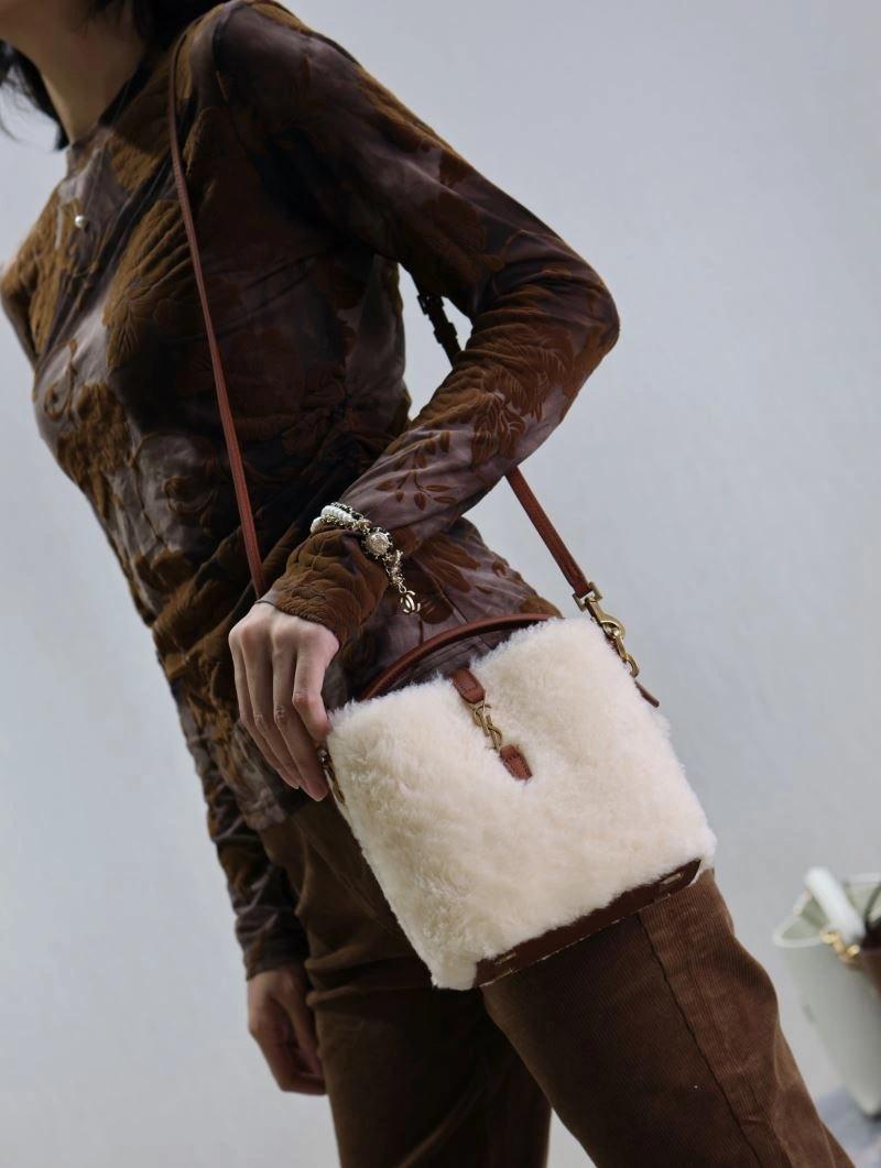 Value-priced YSL Bucket Bags