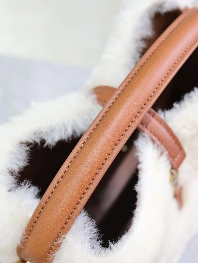 Value-priced YSL Bucket Bags