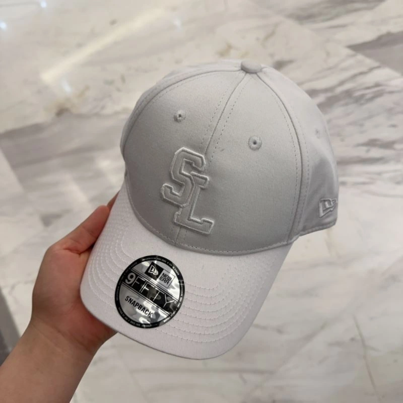 Value-priced YSL Caps