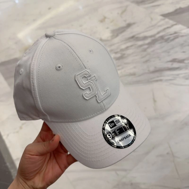 Value-priced YSL Caps