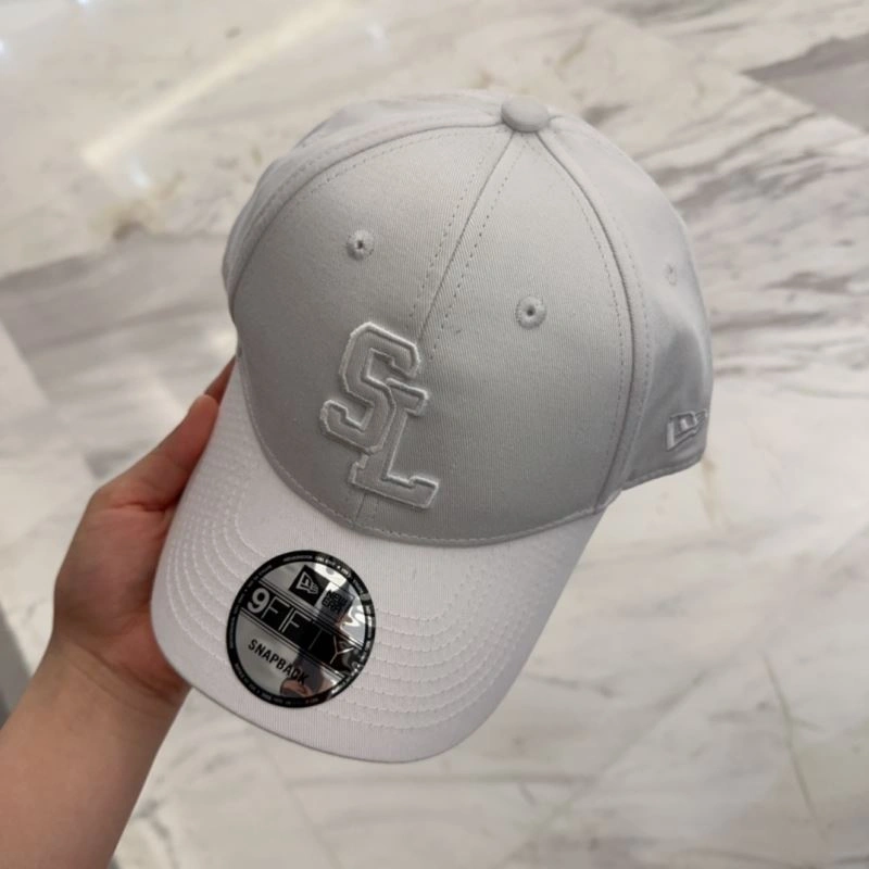 Value-priced YSL Caps