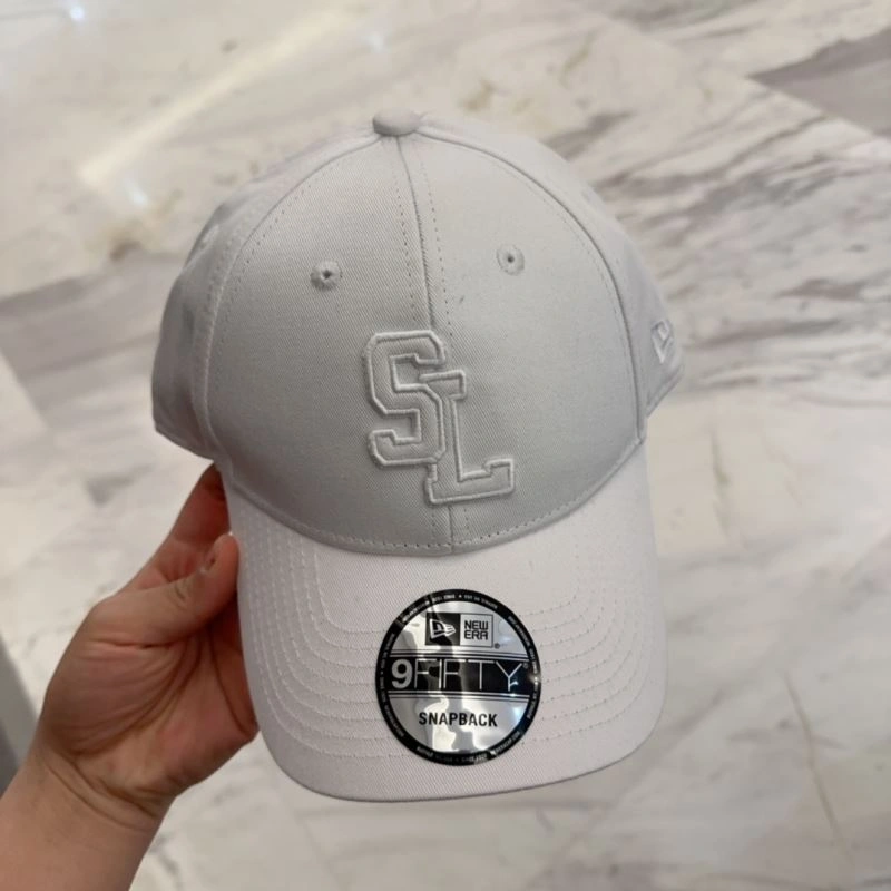Value-priced YSL Caps