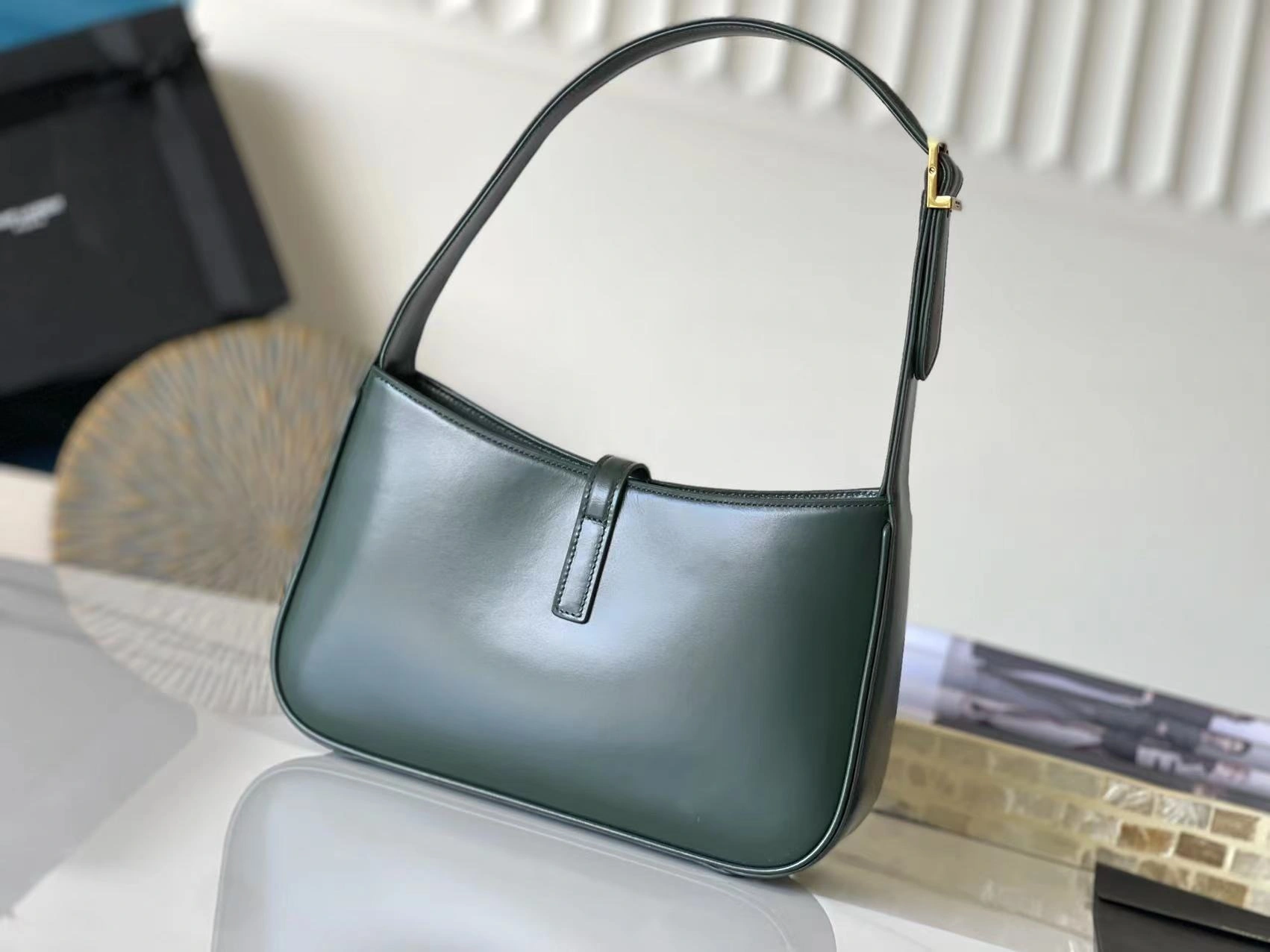 Indistinguishable YSL Hobo Bags