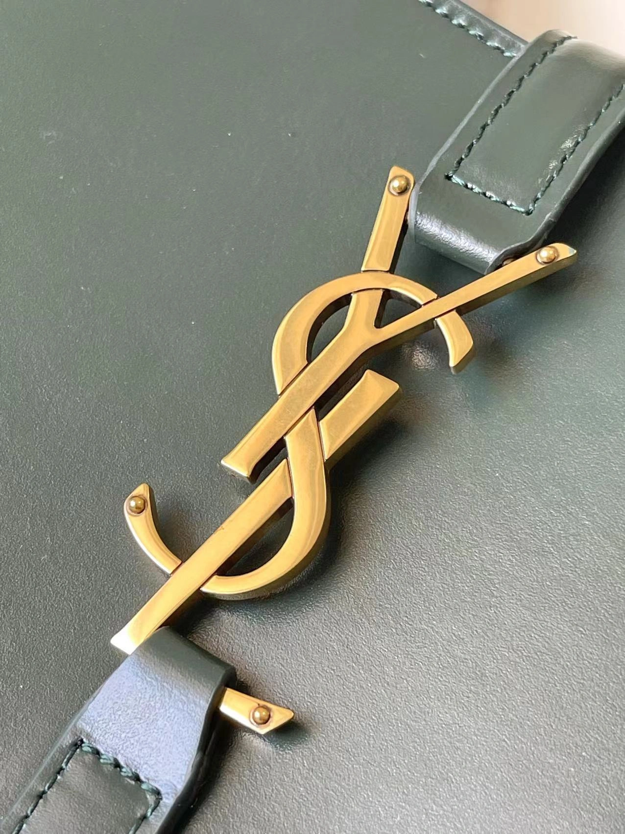 Indistinguishable YSL Hobo Bags