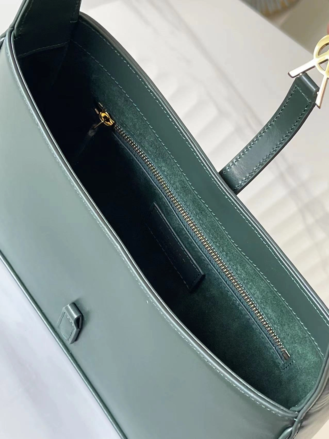 Indistinguishable YSL Hobo Bags