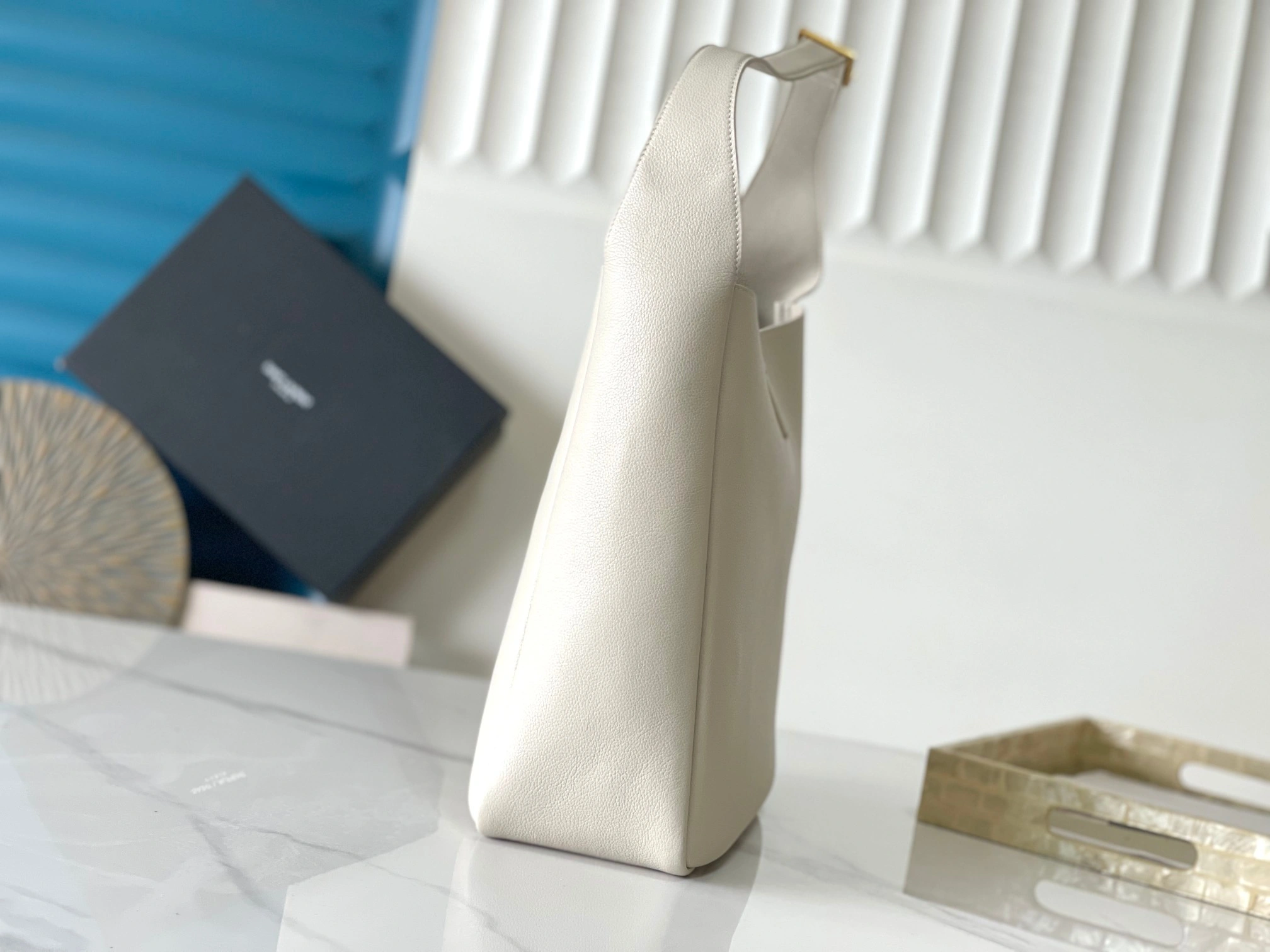 Indistinguishable YSL Hobo Bags