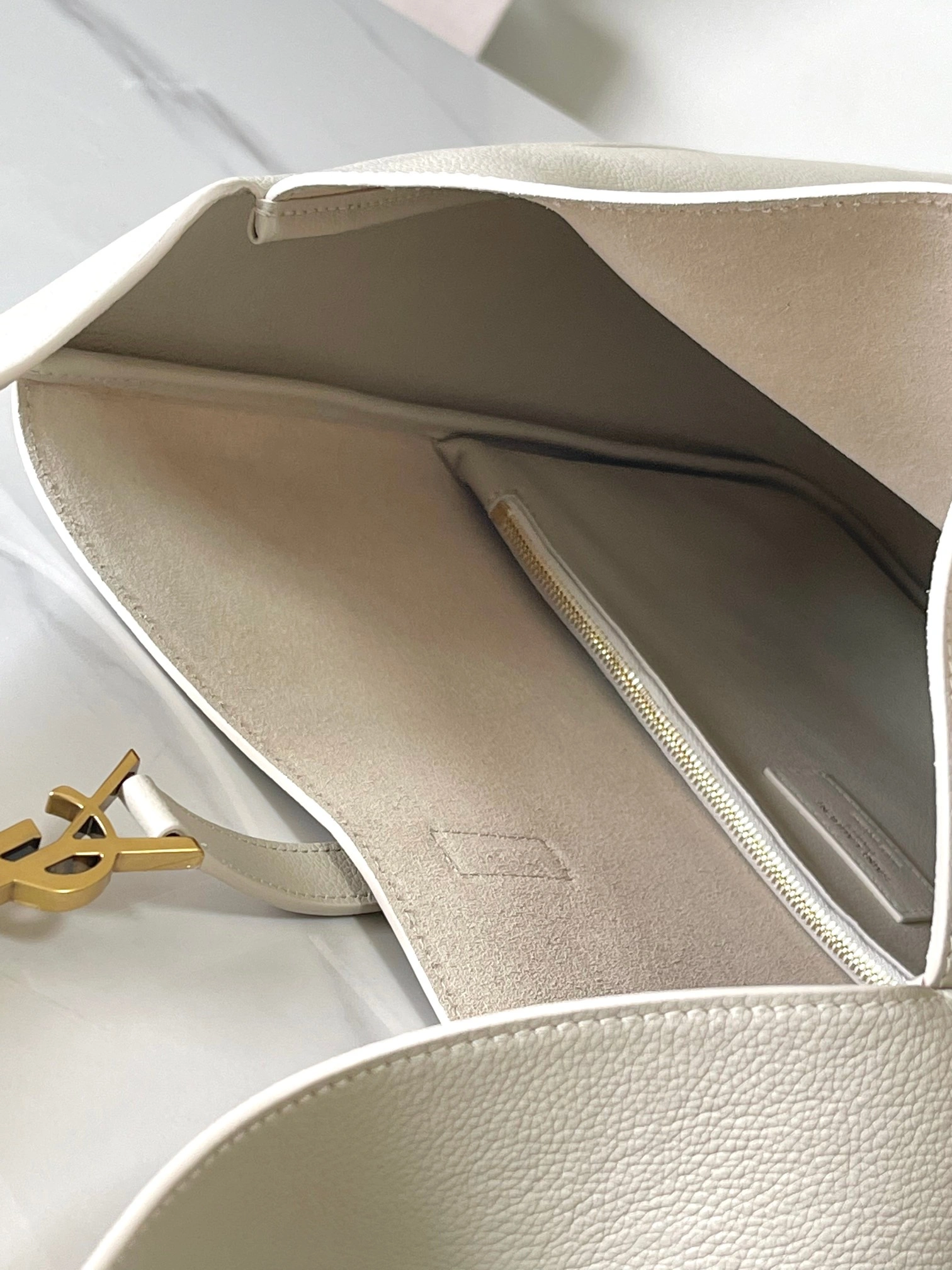 Indistinguishable YSL Hobo Bags