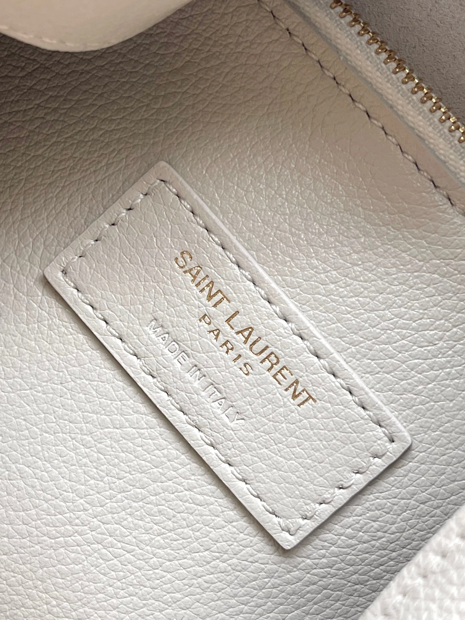 Indistinguishable YSL Hobo Bags
