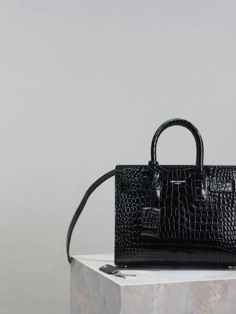 Value-priced YSL Top Handle Bags